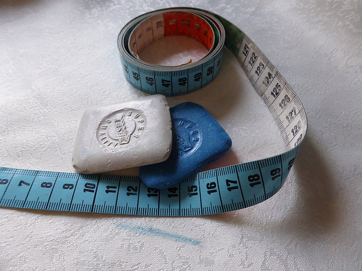 Royalty-Free photo: Blue tape measure and two chalks | PickPik